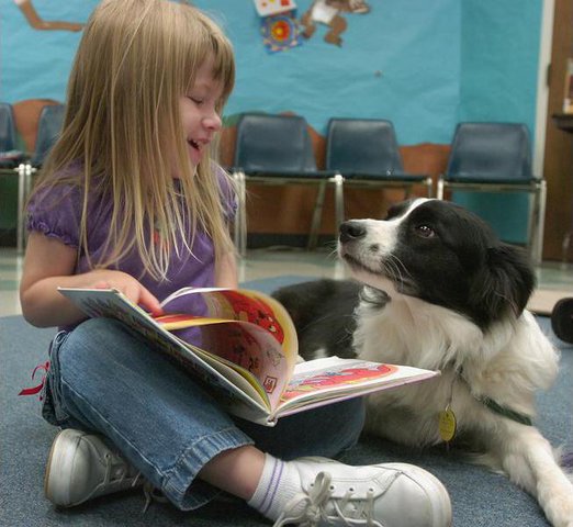 Reading to Rover at the Statesboro library makes reading fun for ...