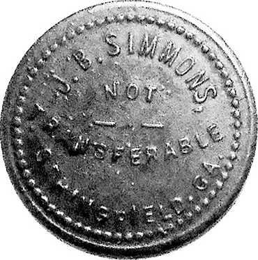 Discovering an old J.B. Simmons token - Effingham Herald