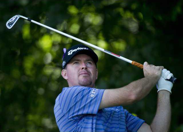 Garrigus sets record, takes lead - Statesboro Herald
