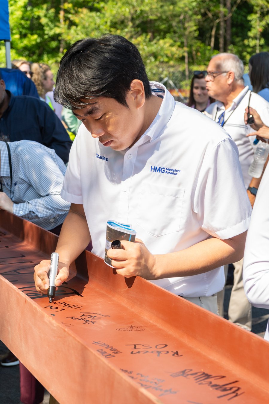 Beam ceremony marks milestone for QuickStart facility - Bryan County News
