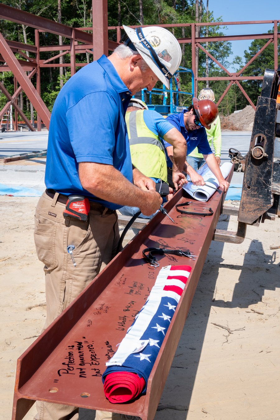 Beam ceremony marks milestone for QuickStart facility - Bryan County News