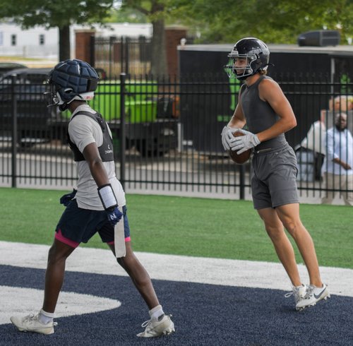 Rebels shine under the cover of GSU practice facility - Effingham Herald