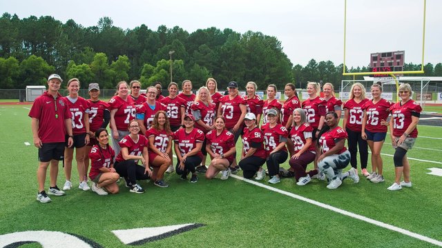 Ready, set, hike! Football moms take the field for interactive ...