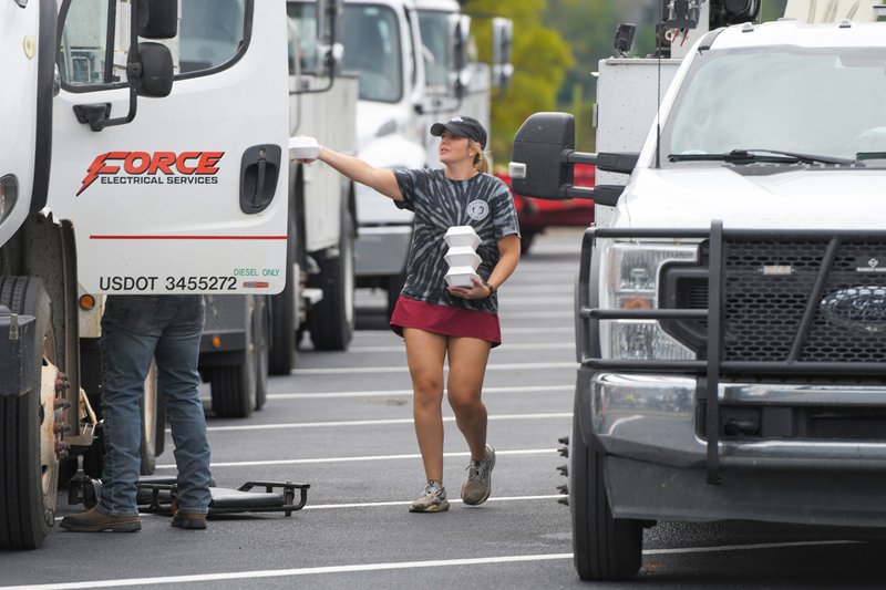 Dolan's Bar-B-Que says thanks to line workers with tasty sandwiches ...